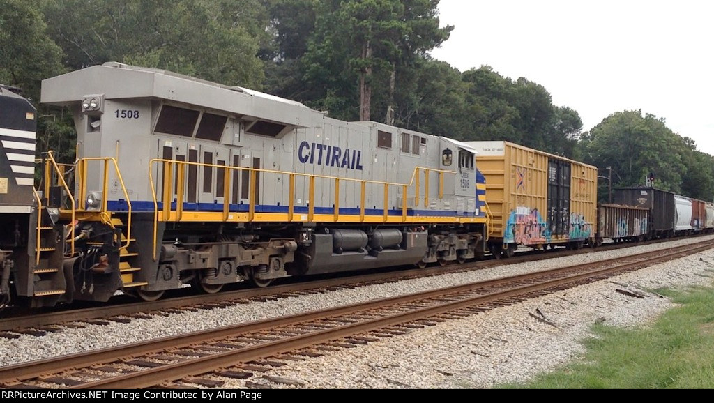 CREX ES44AC 1508 and NS SD70M 2707 give assist to CSX C40-8W 7859